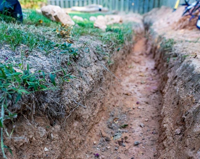 Swales vs. French Drains: Which Option Is Right For My Home?